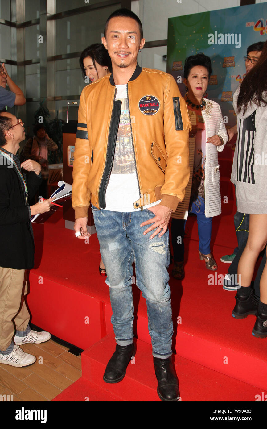 Hong Kong actor Louis Cheung poses at a press conference for the 2014 ...