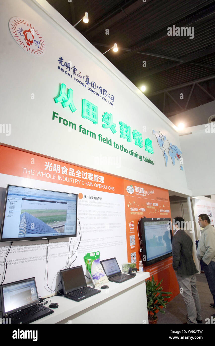 --FILE--Visitors are seen at the stand of Bright Food (Group) Co., Ltd ...