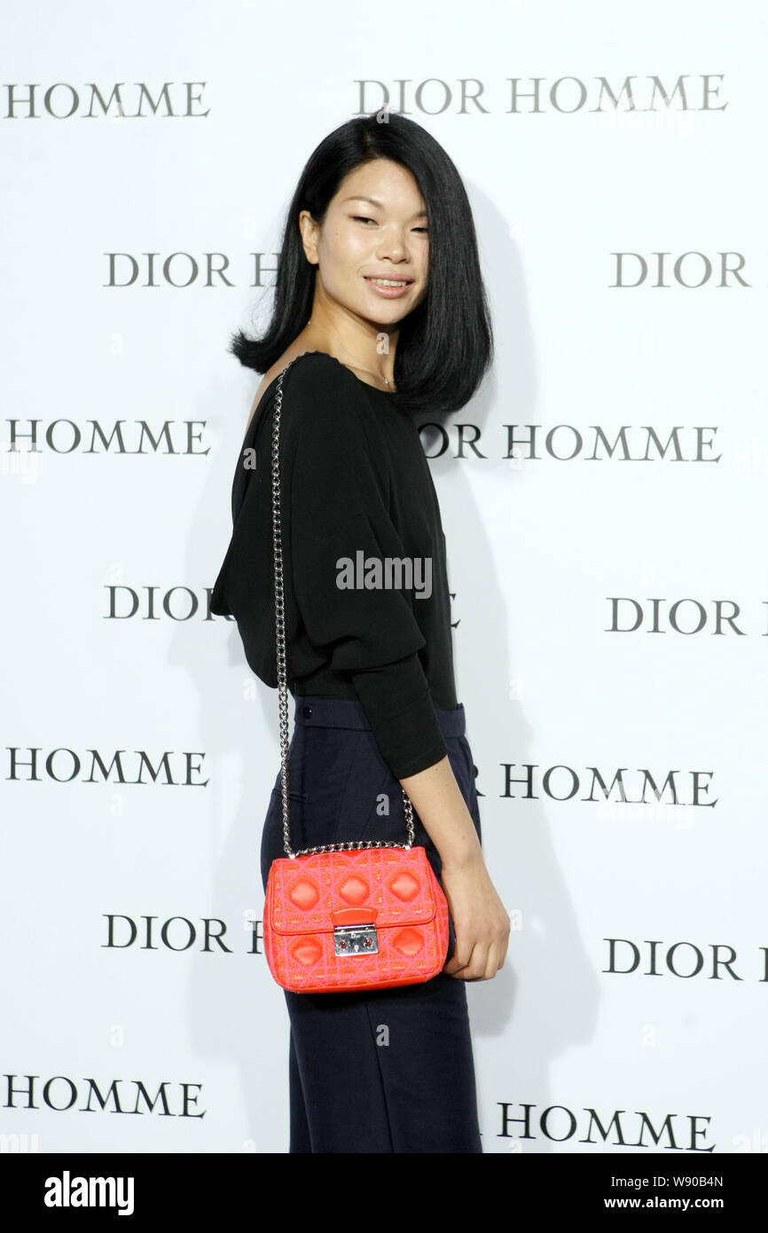 Chinese model Lv Yan poses as she arrives for the Dior Homme Winter ...