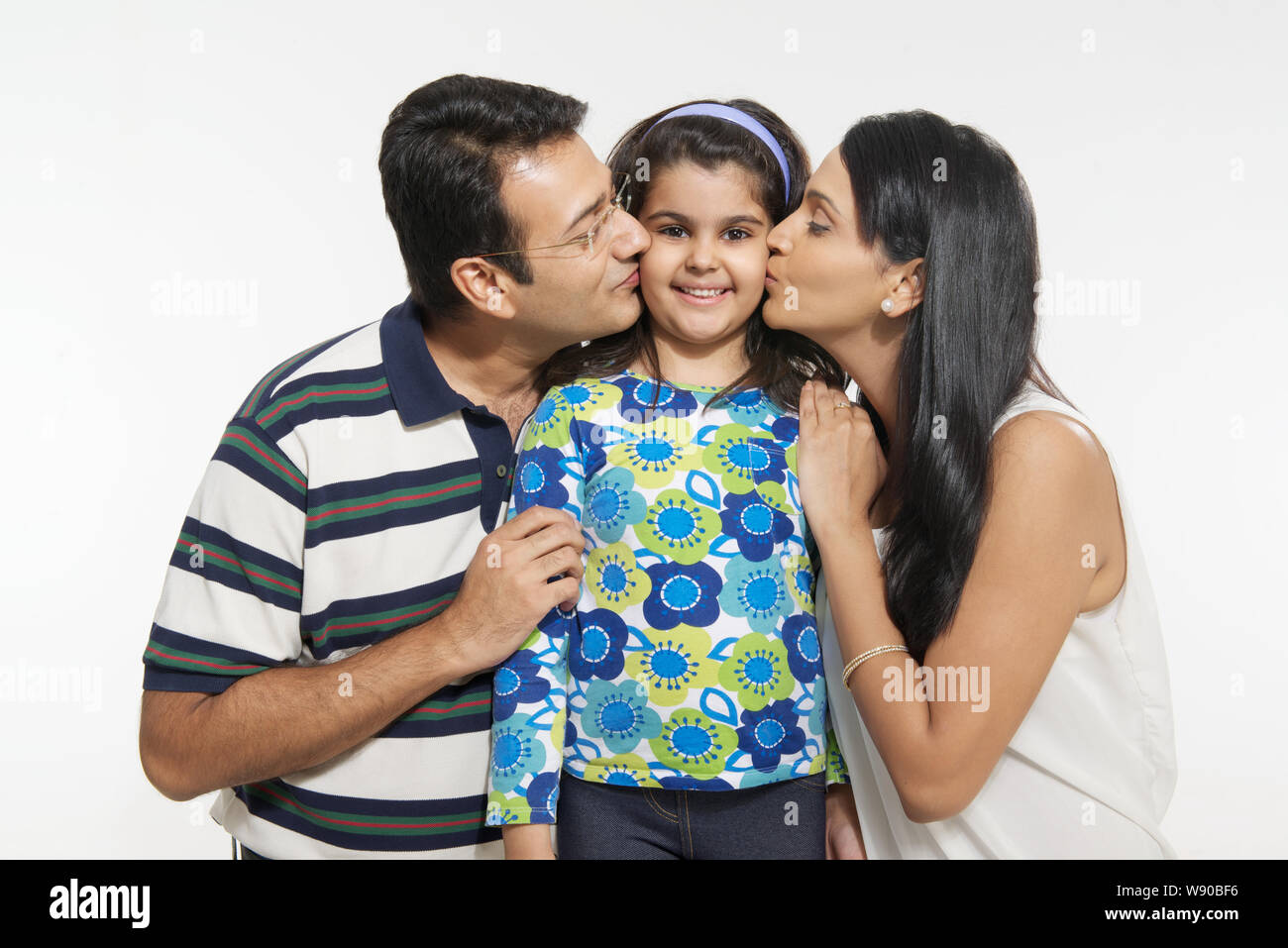 Middle aged indian mother kissing hi-res stock photography and images ...