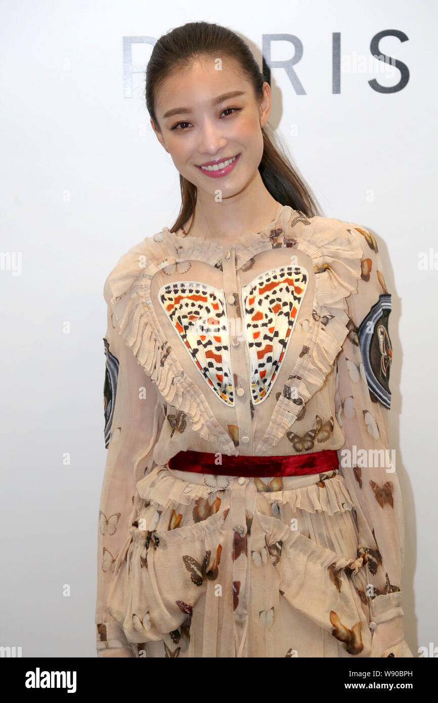 Chinese actress Ni Ni poses during the opening ceremony for Givenchy's ...