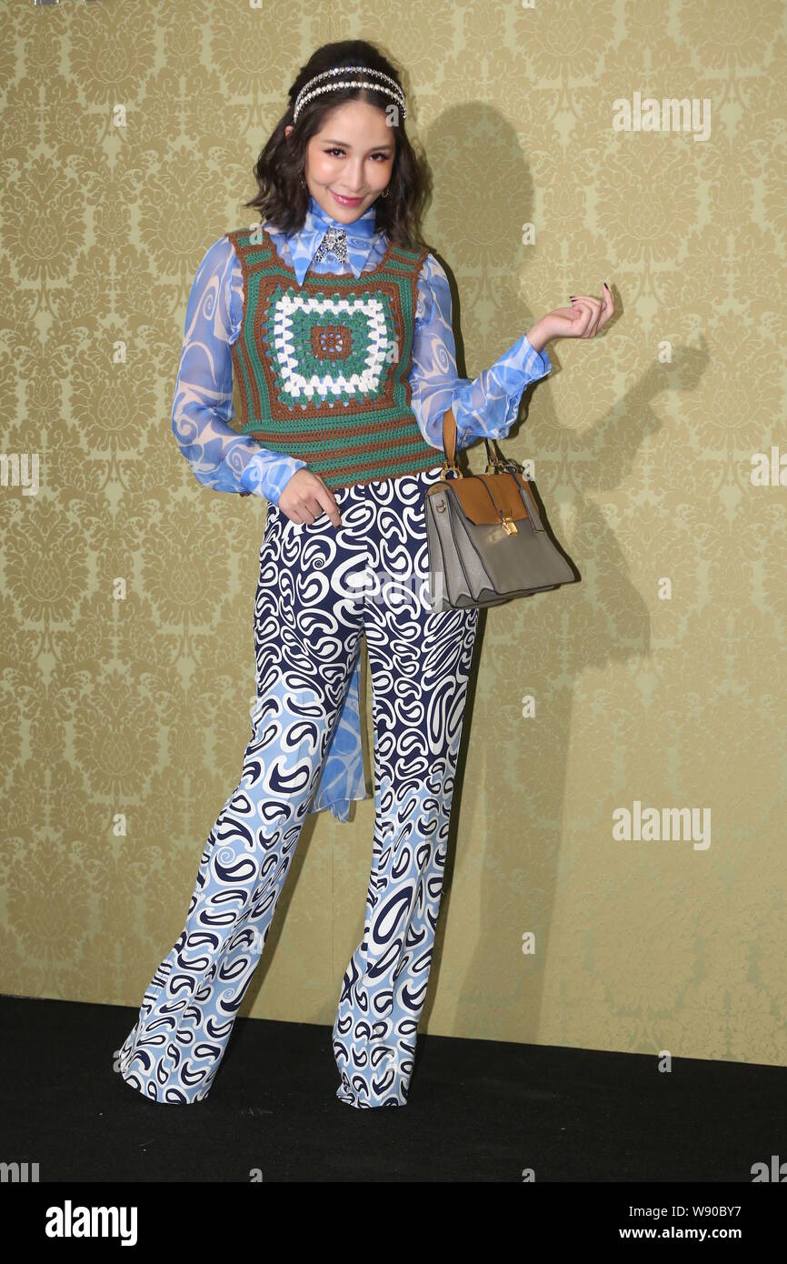 Taiwanese singer Elva Hsiao poses as she arrives for the opening ...