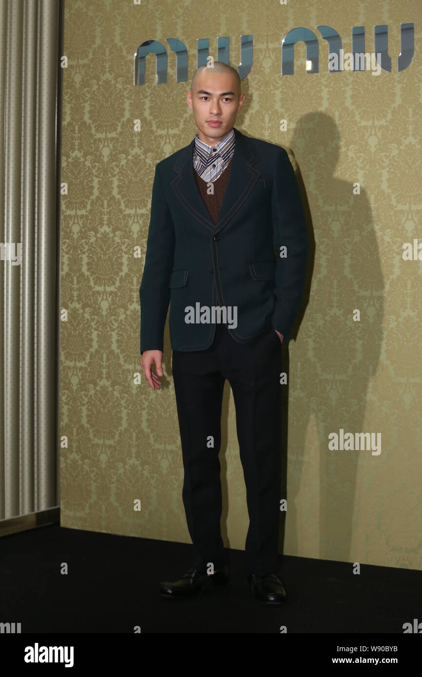 Taiwanese actor Tony Yang poses as he arrives for the opening ceremony ...