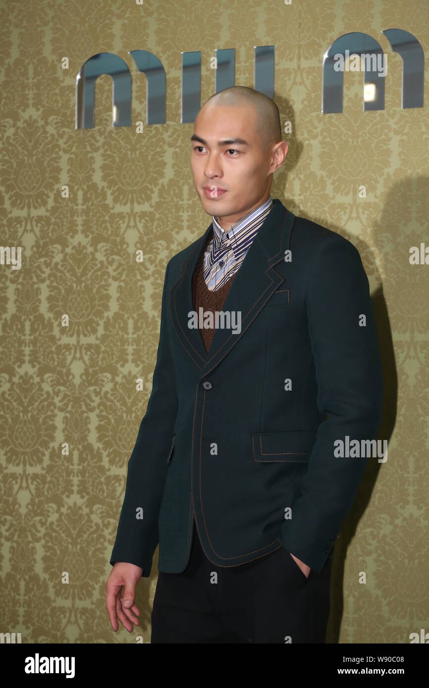 Taiwanese actor Tony Yang poses as he arrives for the opening ceremony ...