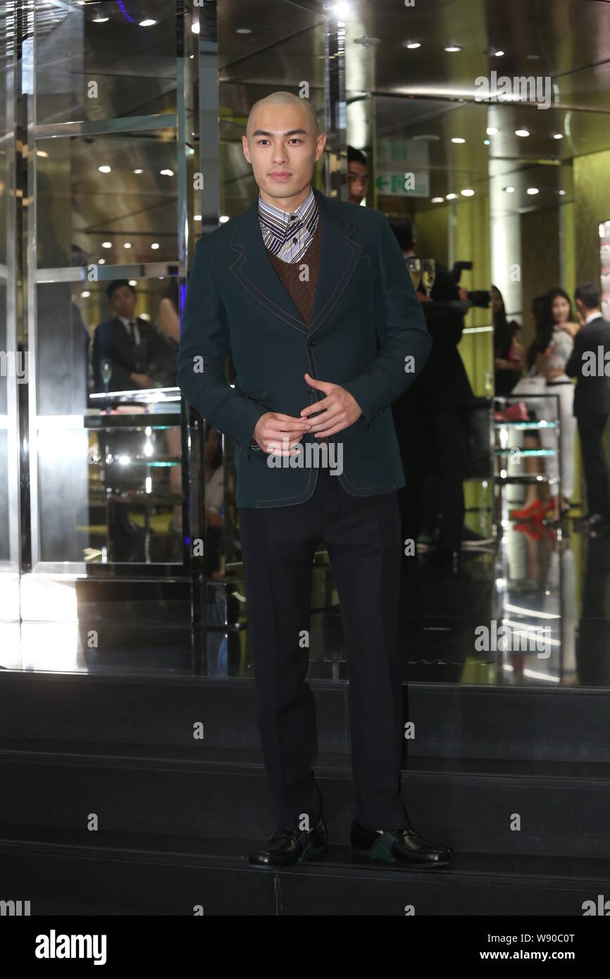 Taiwanese actor Tony Yang poses as he arrives for the opening ceremony ...