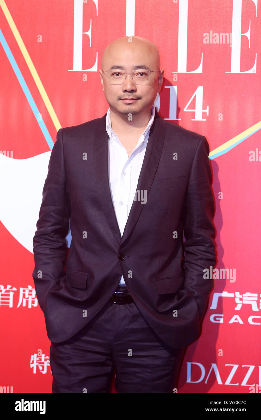 Chinese actor and director Xu Zheng poses as he arrives at the 2014 ...