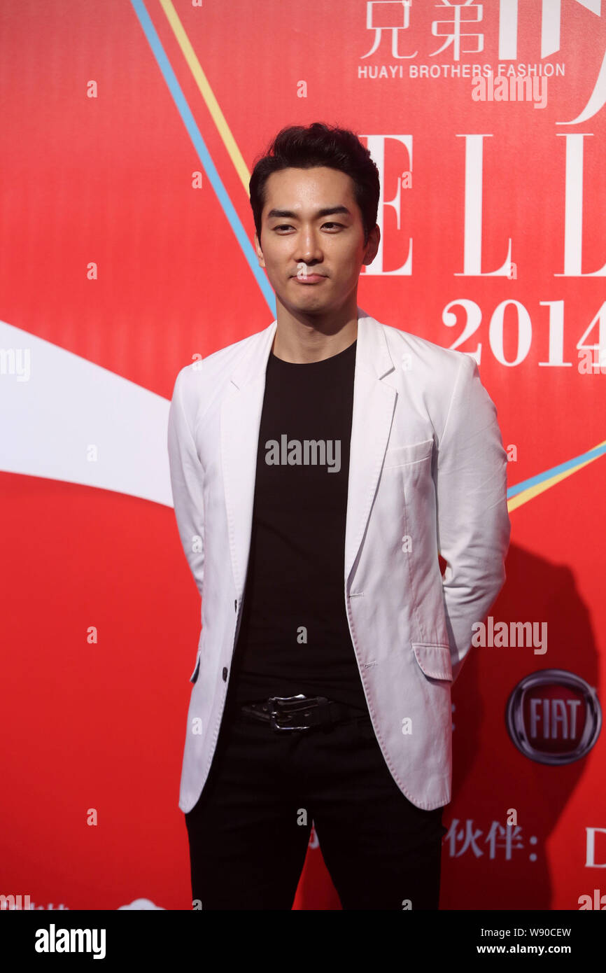 South Korean actor Song Seung-heon poses as he arrives at the 2014 ...