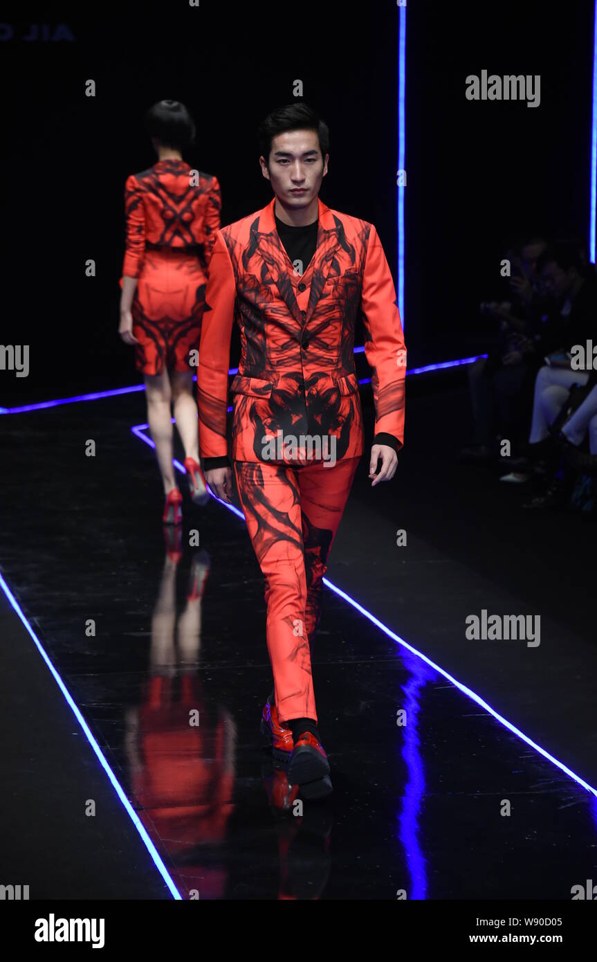 A model displays a new creation by designer Hao Jia at the ODM Hao Jia ...