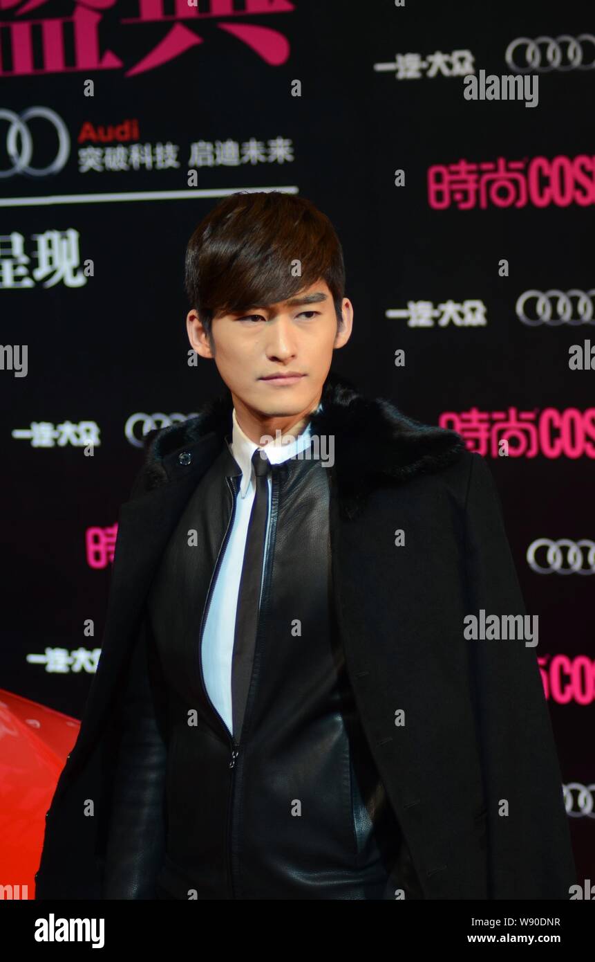Chinese actor and singer Zhang Han poses on the red carpet asshe ...