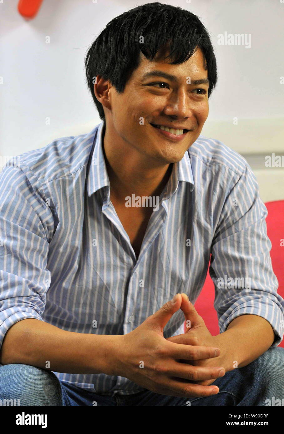 --FILE--American actor Archie David Kao smiles during an interview in ...