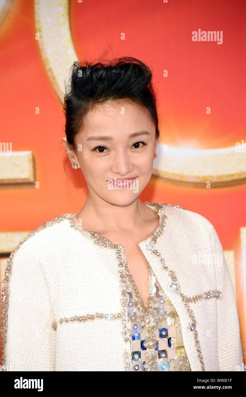 Chinese actress Zhou Xun poses on the red carpet as she arrives for the ...