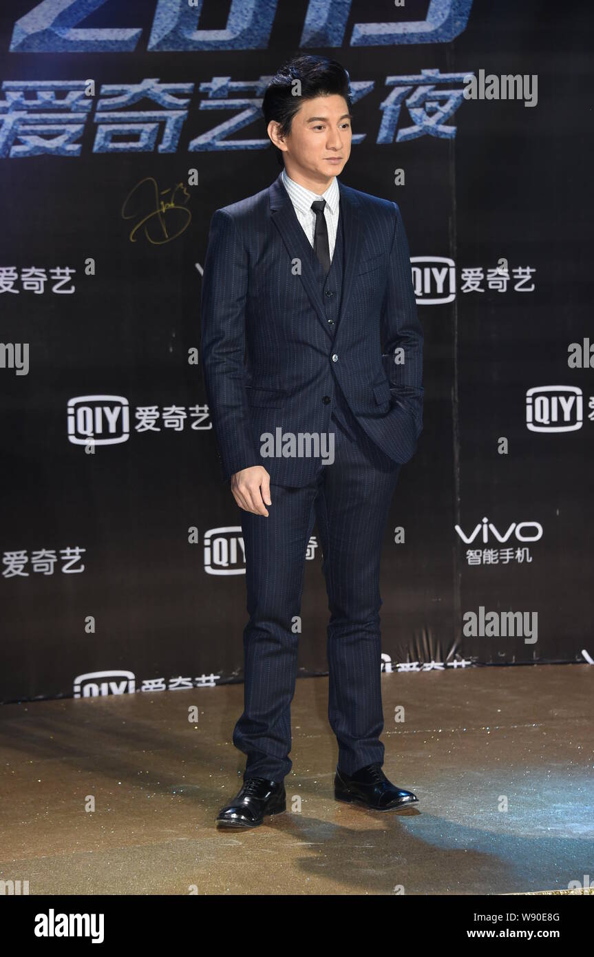 Taiwanese actor Nicky Wu poses during a fashion event by iQIYI in ...