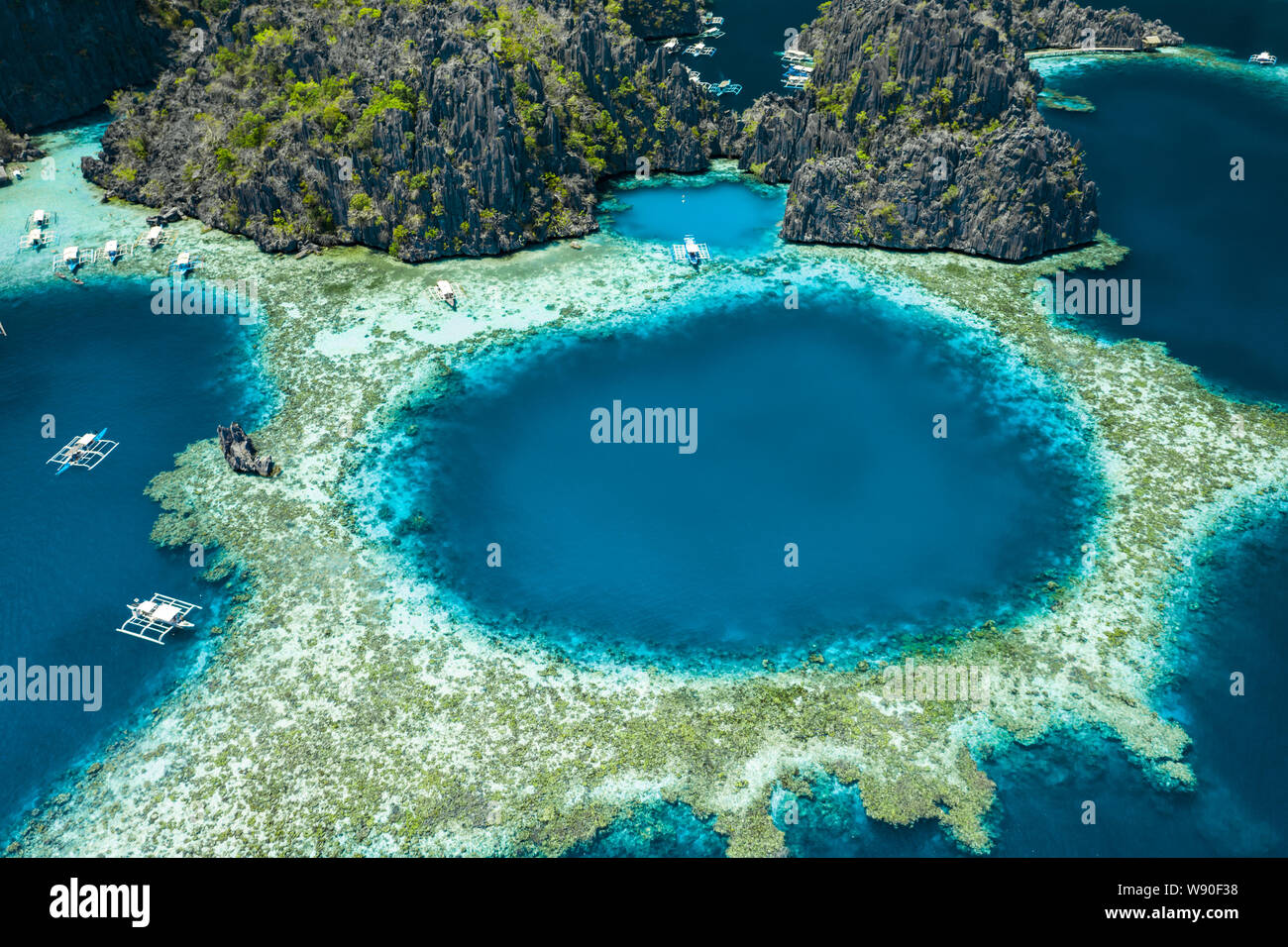 Aerial view of beautiful lagoons and limestone cliffs of Coron, Palawan ...