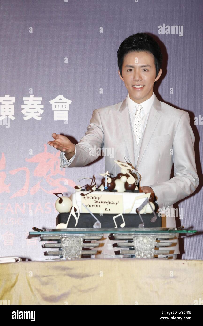 Chinese pianist Li Yundi poses during a press conference for his ...