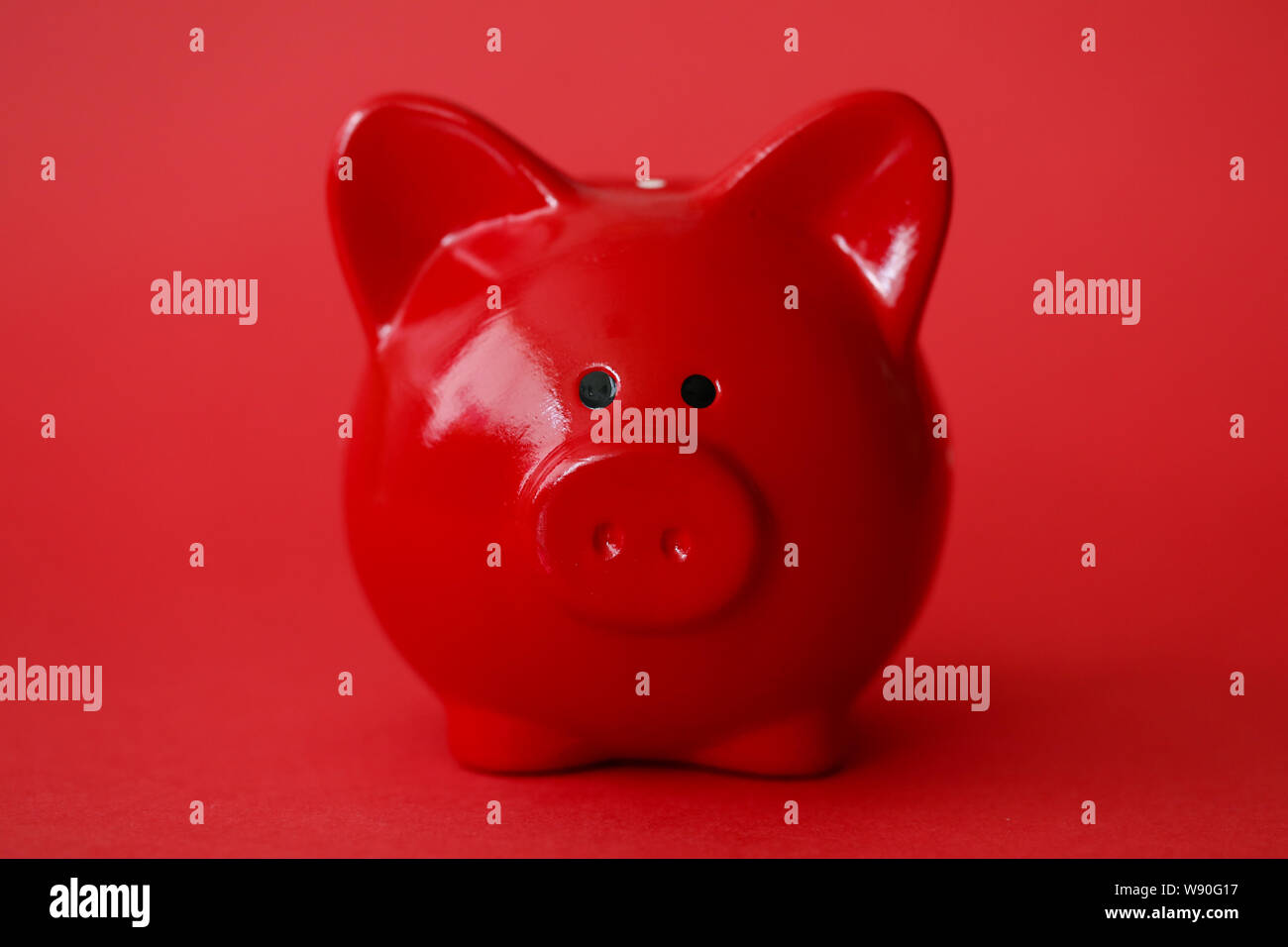 Red piggy box background. Fast banking credit Stock Photo - Alamy