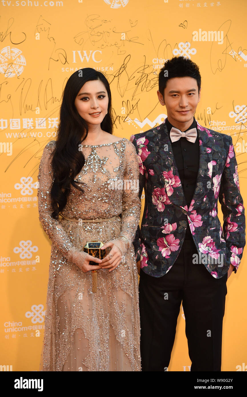Chinese actress Fan Bingbing, left, and actor Huang Xiaoming pose on ...