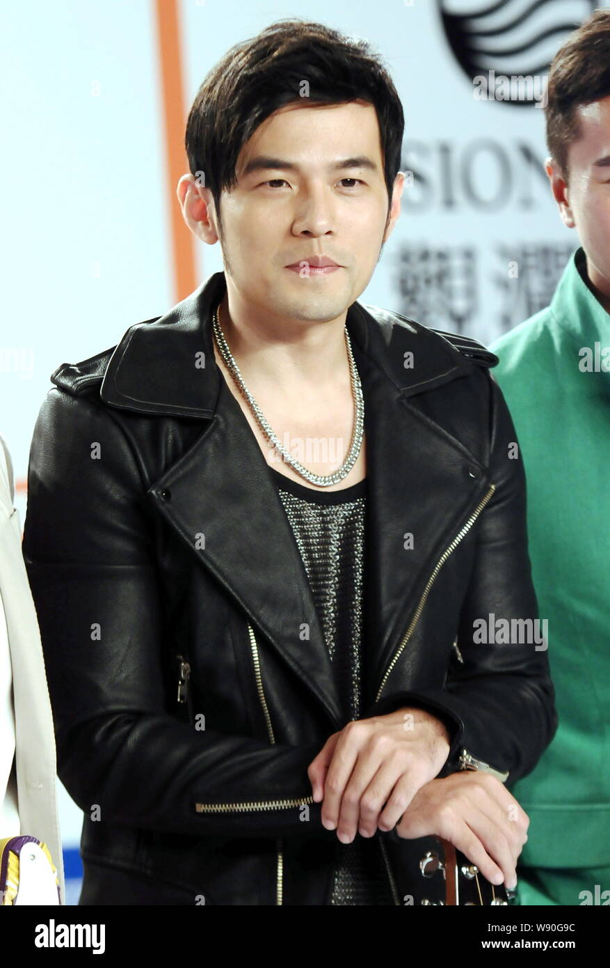 Taiwanese singer and actor Jay Chou poses during a press conference for ...