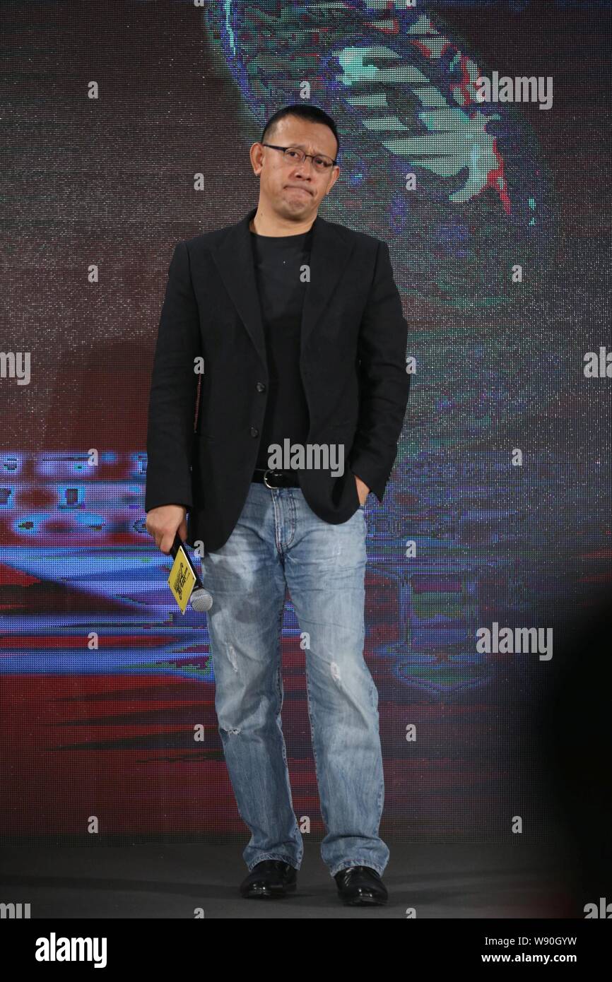 Chinese director and actor Jiang Wen poses at a press conference to ...