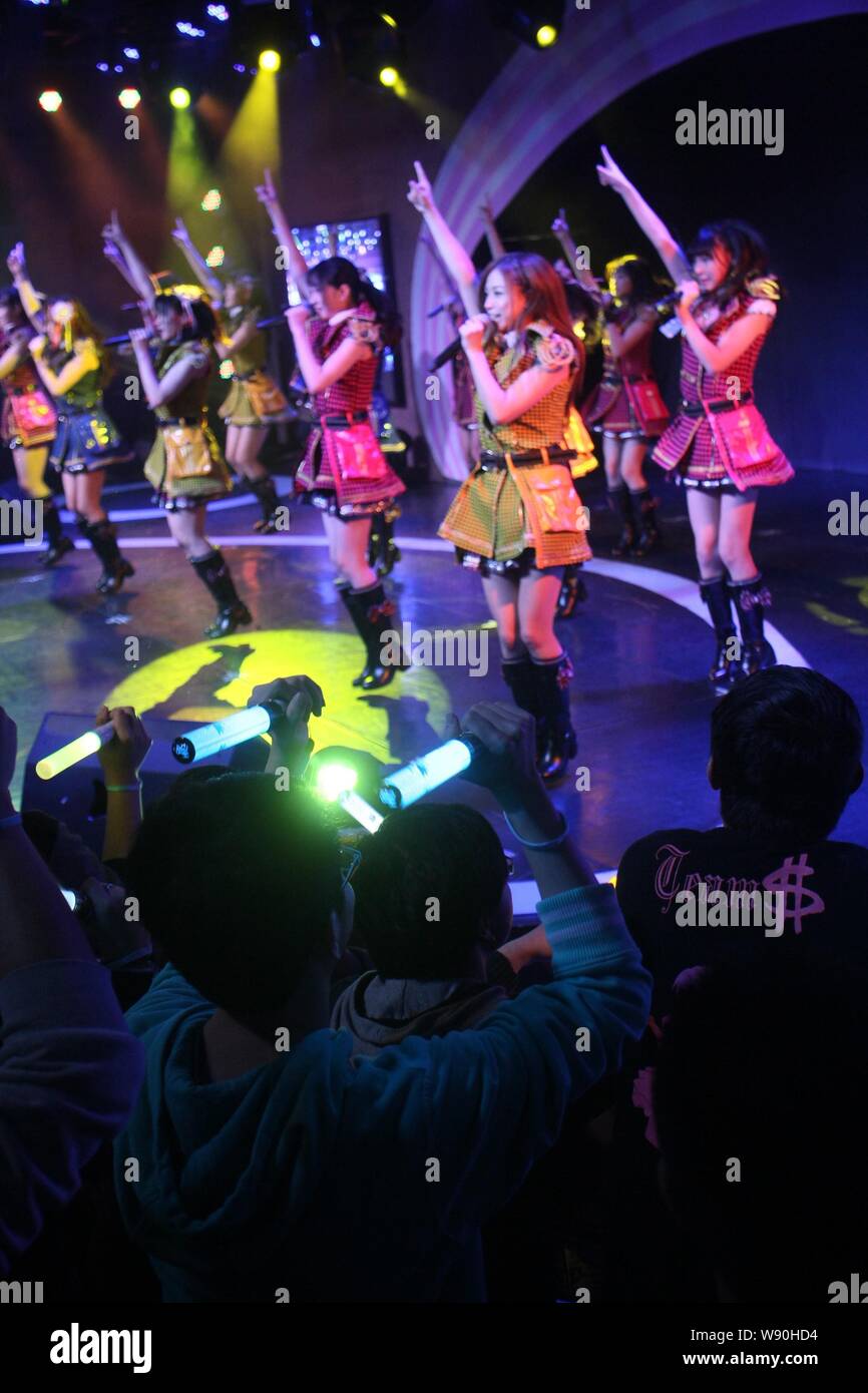 Members of idol group SNH48, a sister group of Japanese pop girl group ...