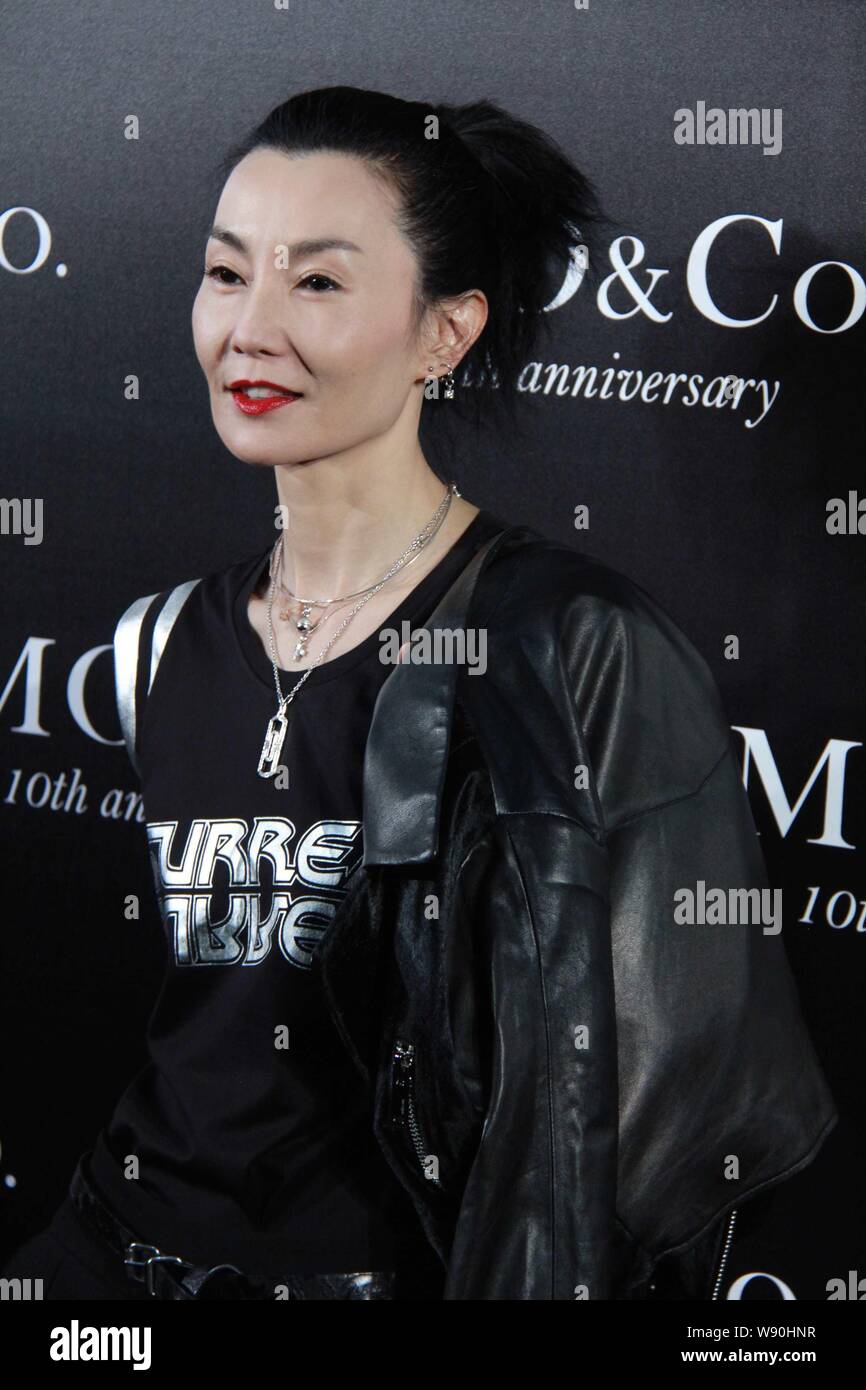 Hong Kong actress Maggie Cheung poses at a fashion event for the 10th ...