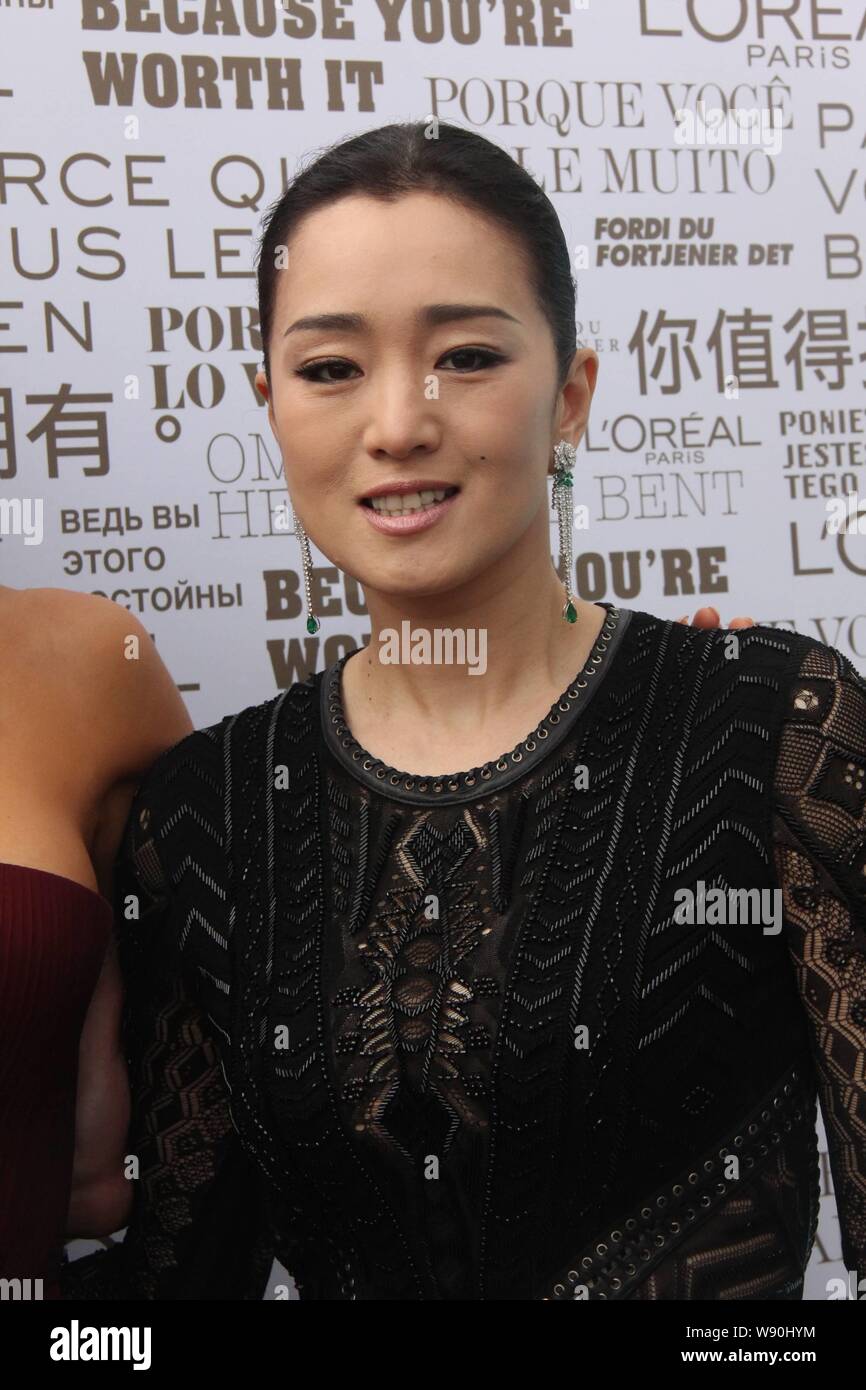 Chinese actress Gong Li poses at a promotional event of LOreal Paris ...
