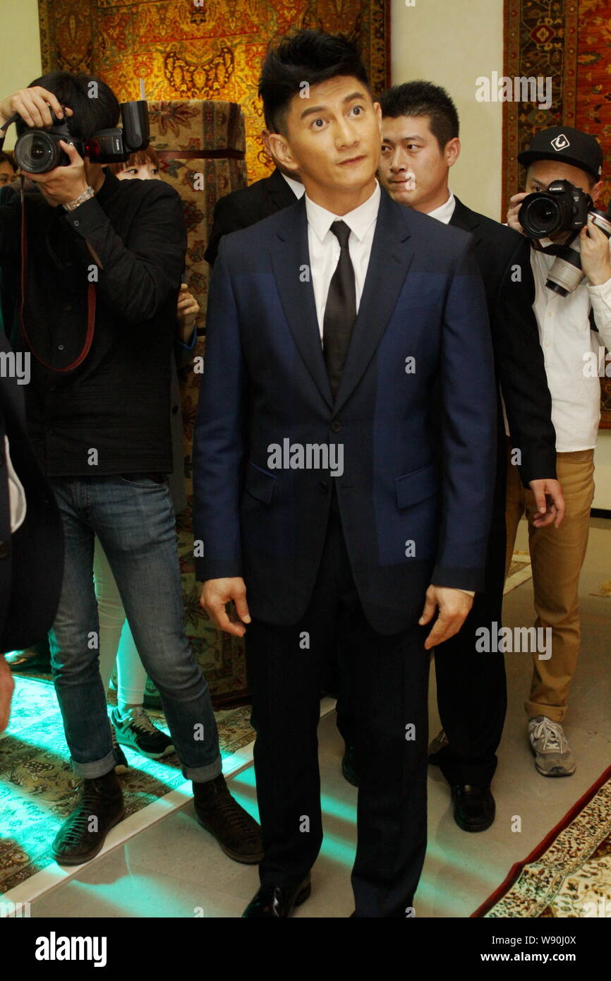 Taiwanese actor Nicky Wu, front, attends the opening ceremony for a new ...