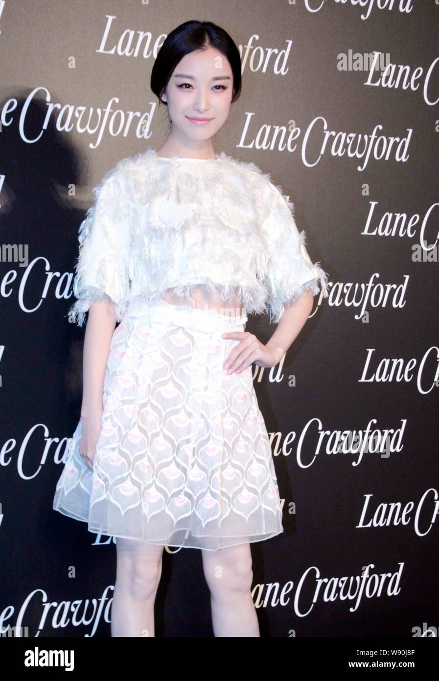 Chinese actress Ni Ni poses as she arrives for an anniversary ...