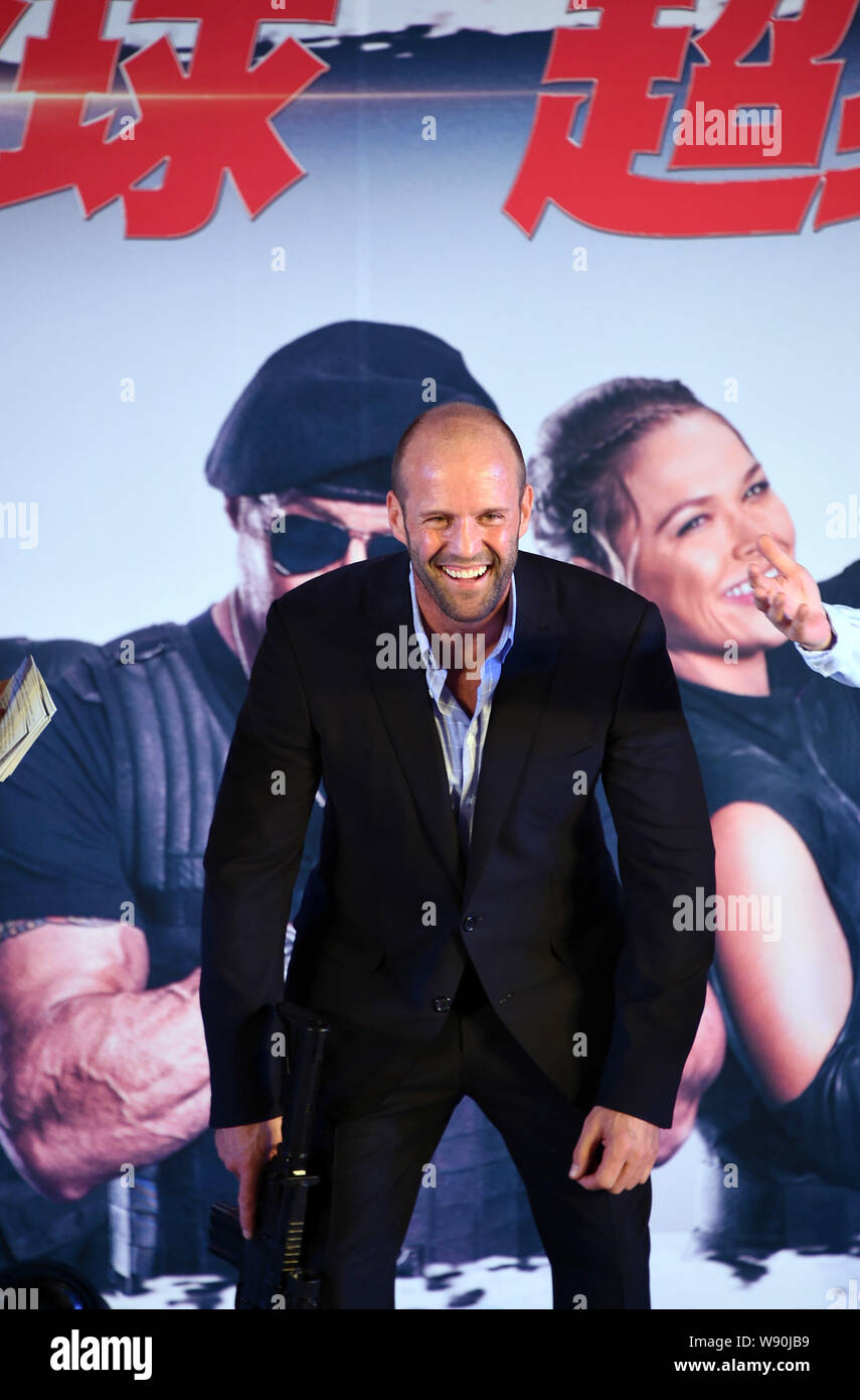 British actor Jason Statham laughs during a press conference for his ...