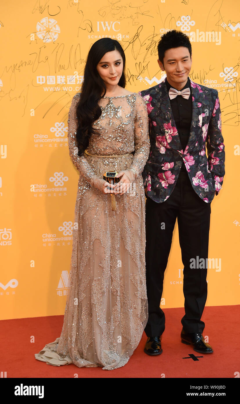 Chinese actress Fan Bingbing, left, and actor Huang Xiaoming pose on ...