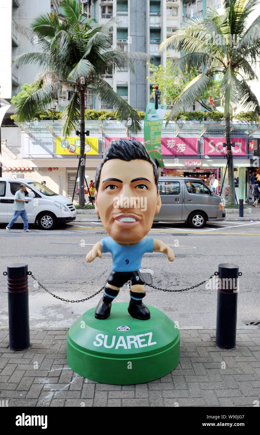 A cartoon figure of Uruguayan football star Luis Alberto Suarez is seen ...
