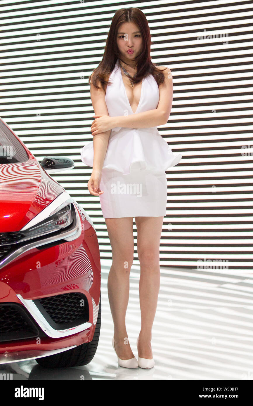 Chinese model Zhou Li poses at the stand of Chery during the 13th ...