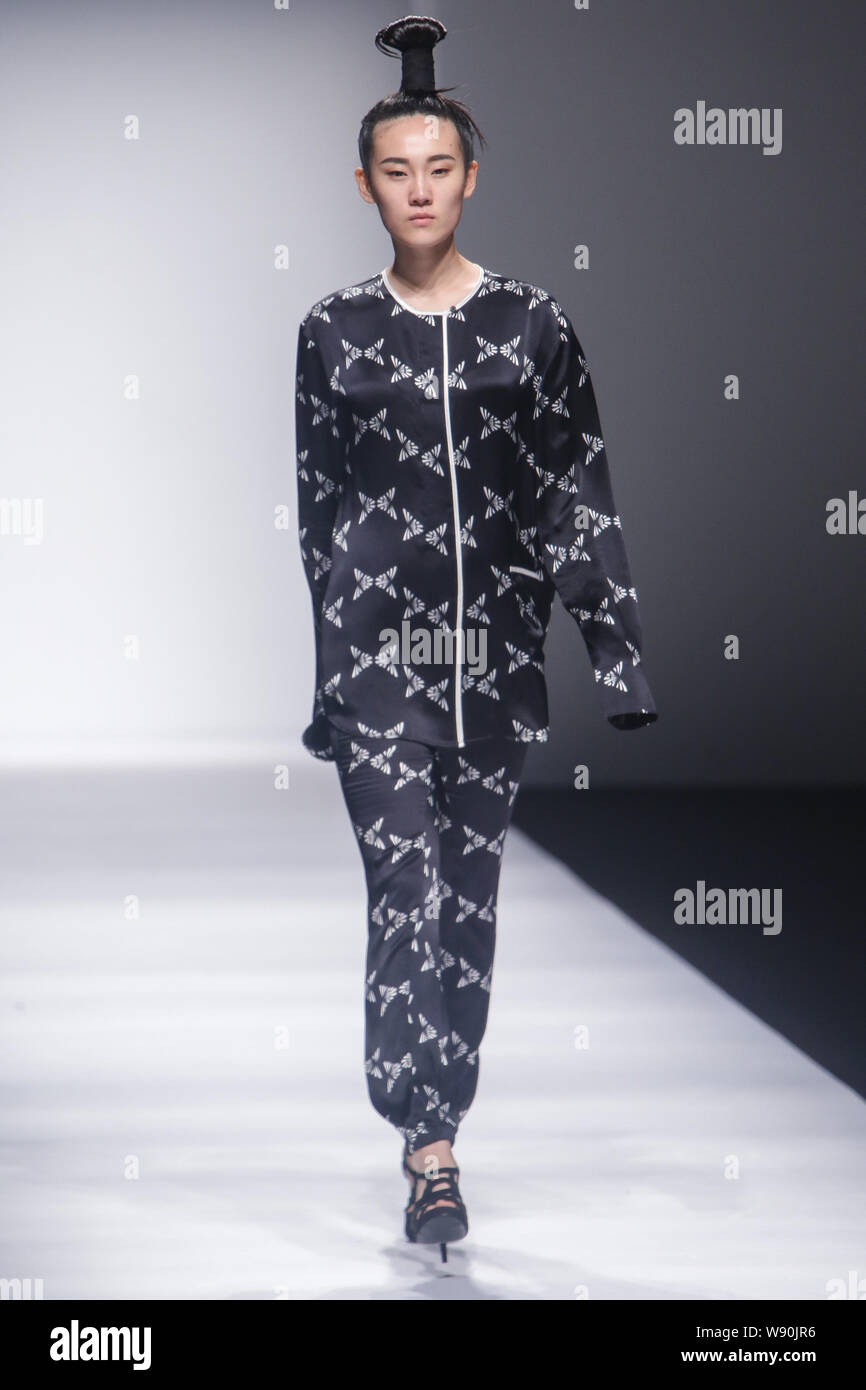 A model displays a new creation at the Jess Zhao fashion show during ...