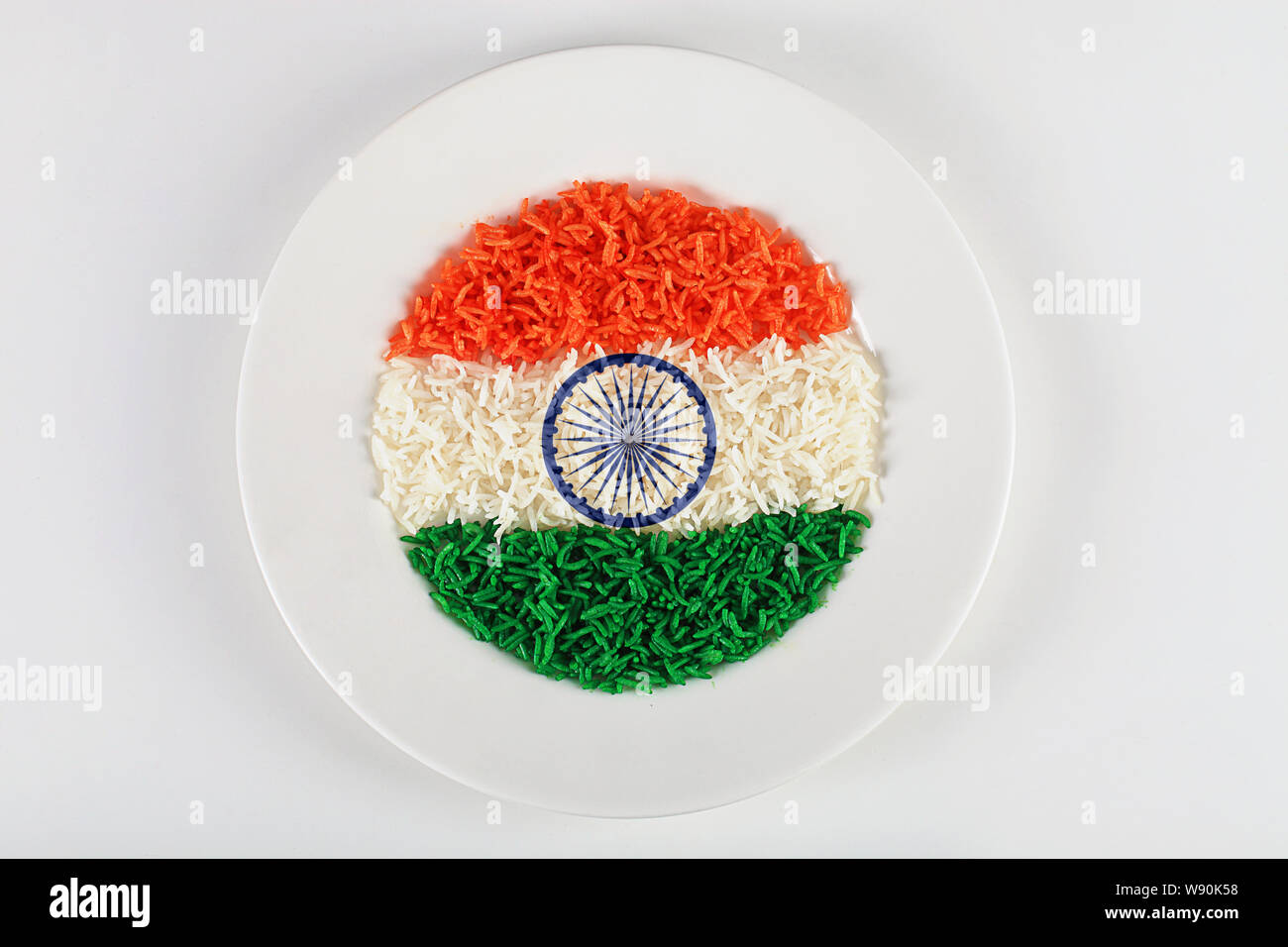 Rice served in a plate and representing Indian Flag Stock Photo - Alamy