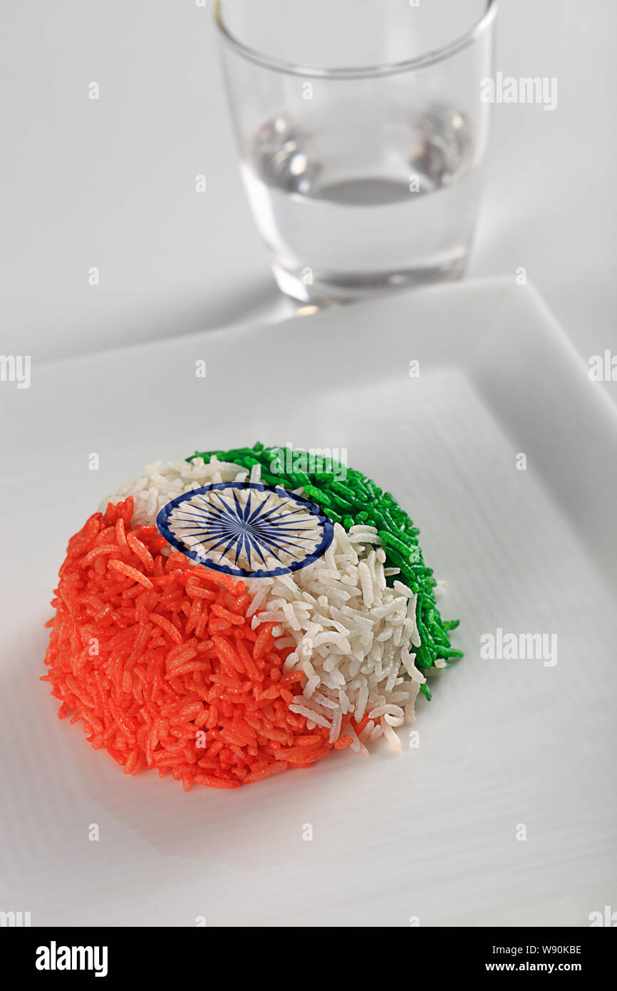 Rice served in a tray and representing Indian Flag Stock Photo - Alamy