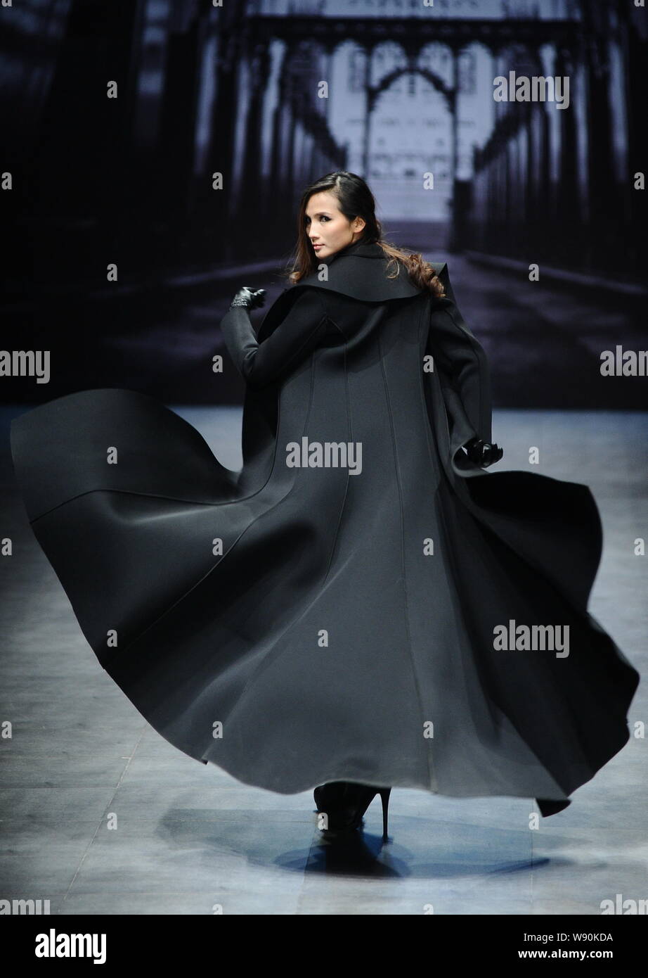 Chinese supermodel Yolanda Huang displays a new creation at the JWB ...