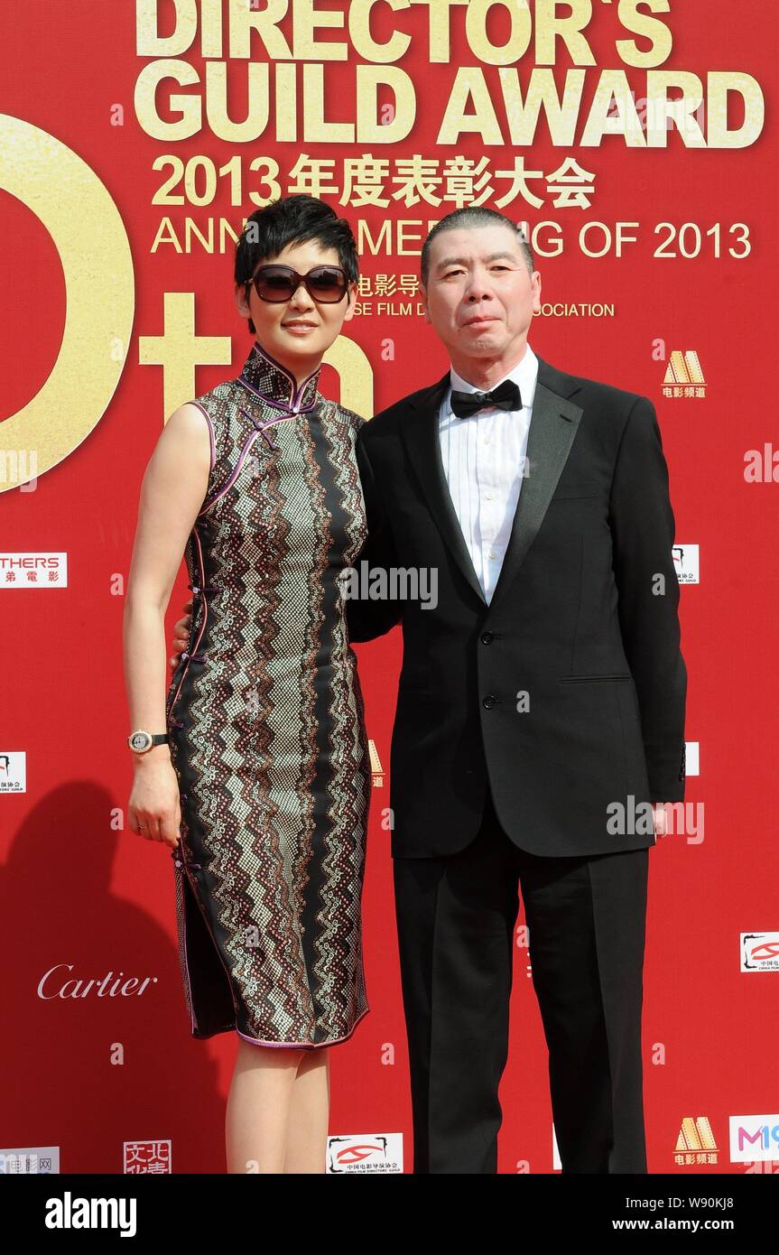 Chinese director Feng Xiaogang, right, and his actress wife Xu Fan pose ...