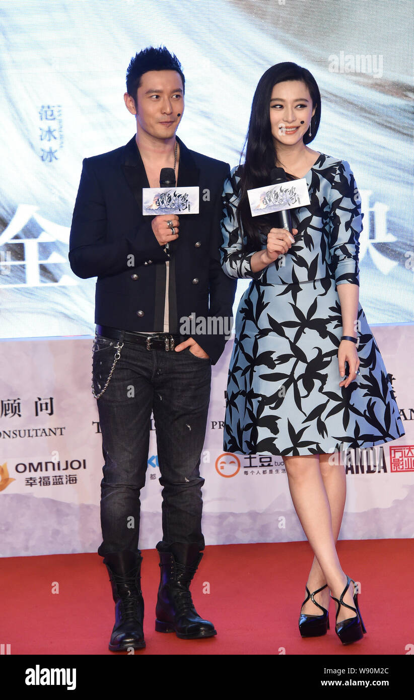 Chinese actor Huang Xiaoming, left, and actress Fan Bingbing pose with ...