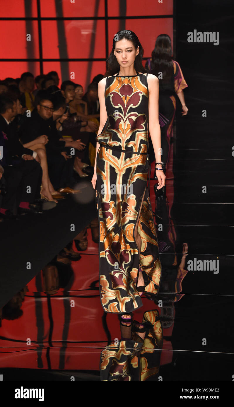 A model displays a new creation from the Gucci Spring/Summer 2014 ...