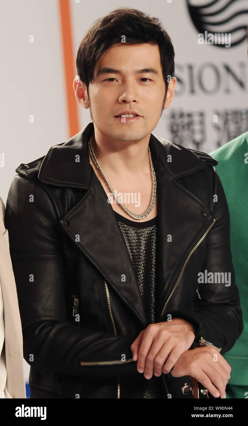 Taiwanese singer and actor Jay Chou poses during a press conference for ...