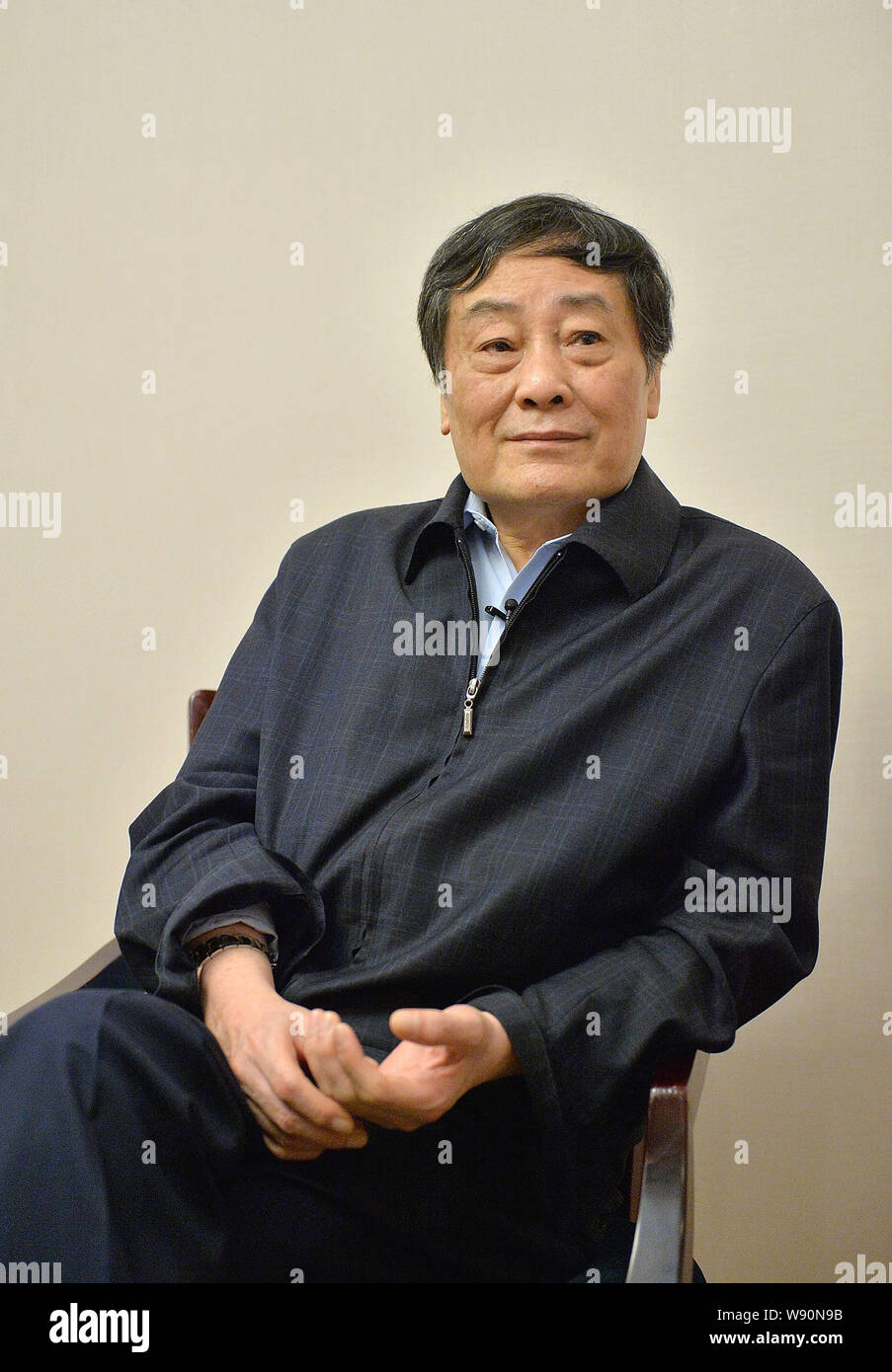 Zong Qinghou, Chairman of Wahaha Group, listens during an interview in ...