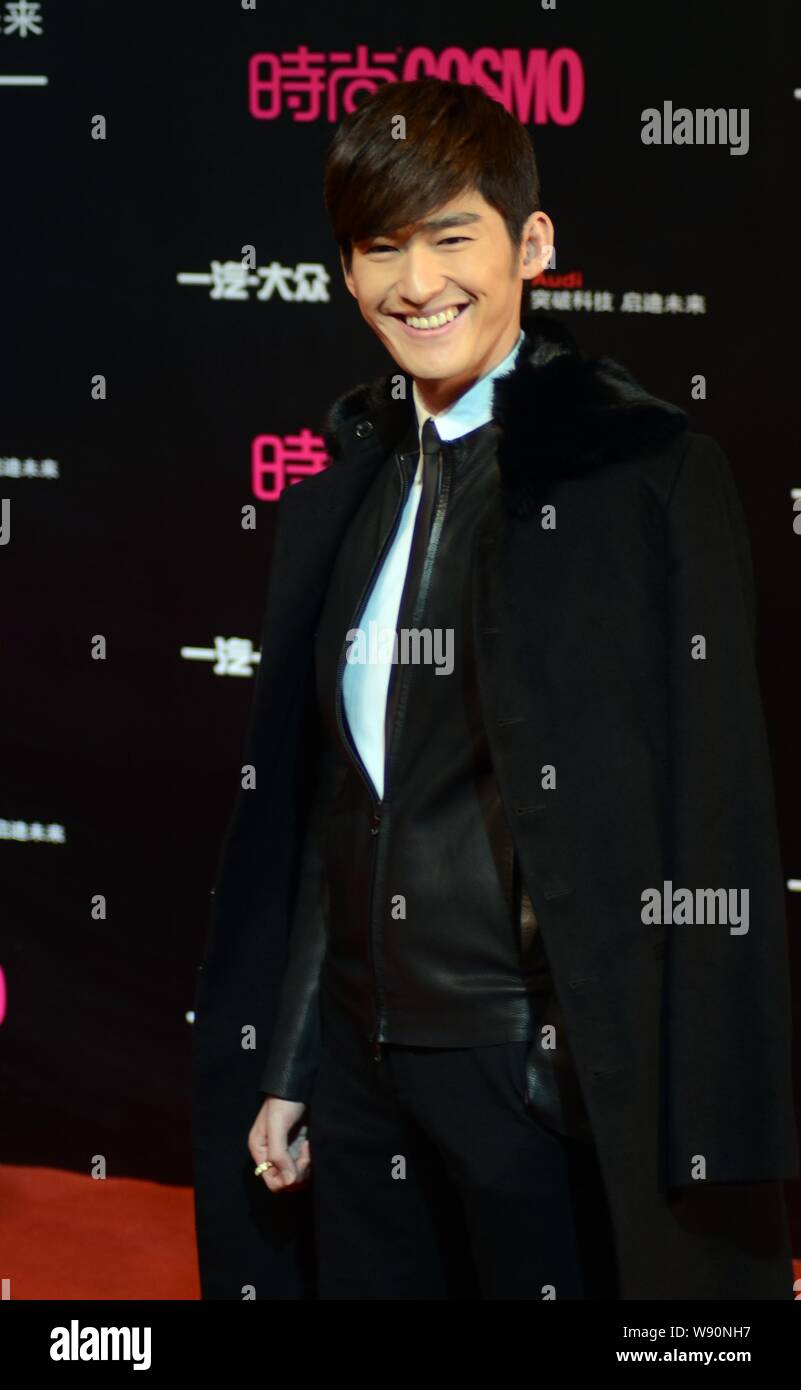 Chinese actor and singer Zhang Han smiles on the red carpet asshe ...