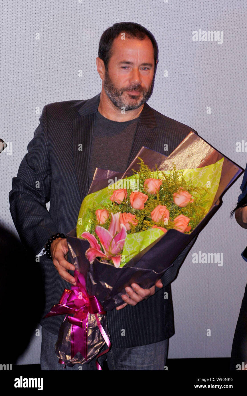 American director Nick Powell poses at a press conference for his new ...