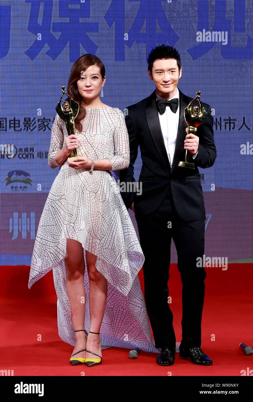 Chinese director and actress Zhao Wei, left, and Chinese actor Huang ...