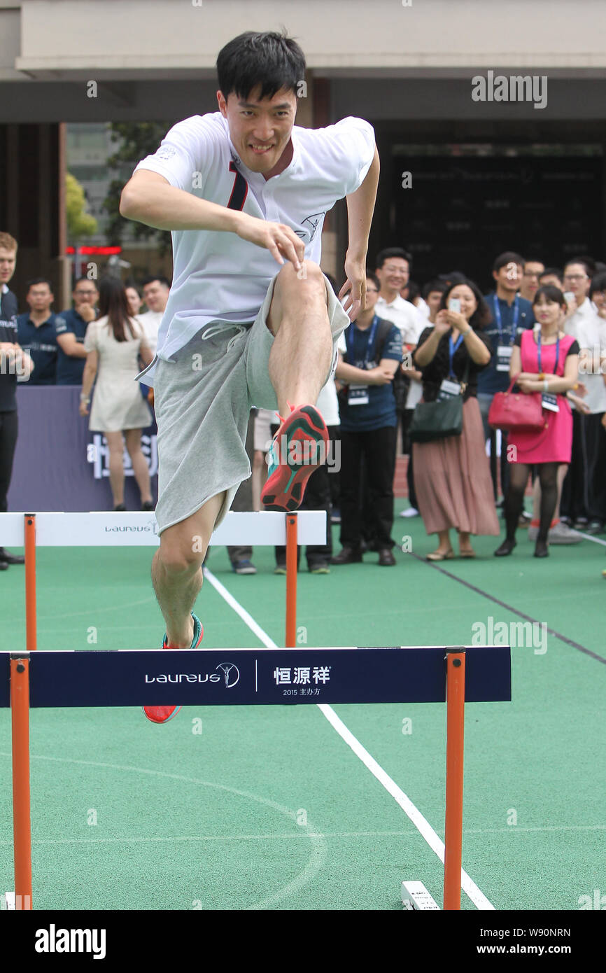 Chinese star hurdler Liu Xiang shows his hurdle skills to Chinese ...