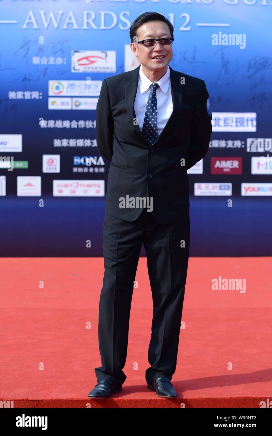 Hong Kong director Andrew Lau Wai-keung poses on the red carpet for the ...
