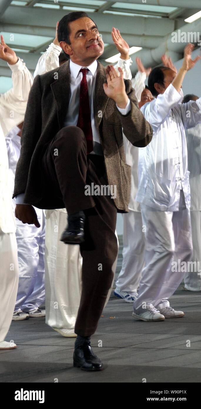 English actor Rowan Atkinson plays Mr. Bean during a filming session ...