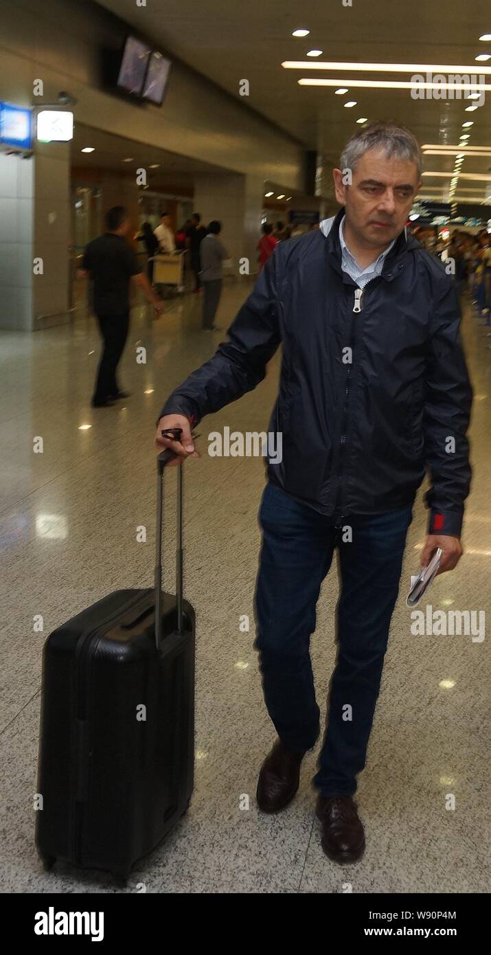 English actor Rowan Atkinson arrives at the Shanghai Pudong ...