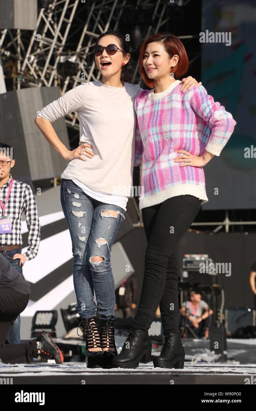 Ella Chen, left, and Selina Jen of Taiwanese girl group S.H.E pose ...