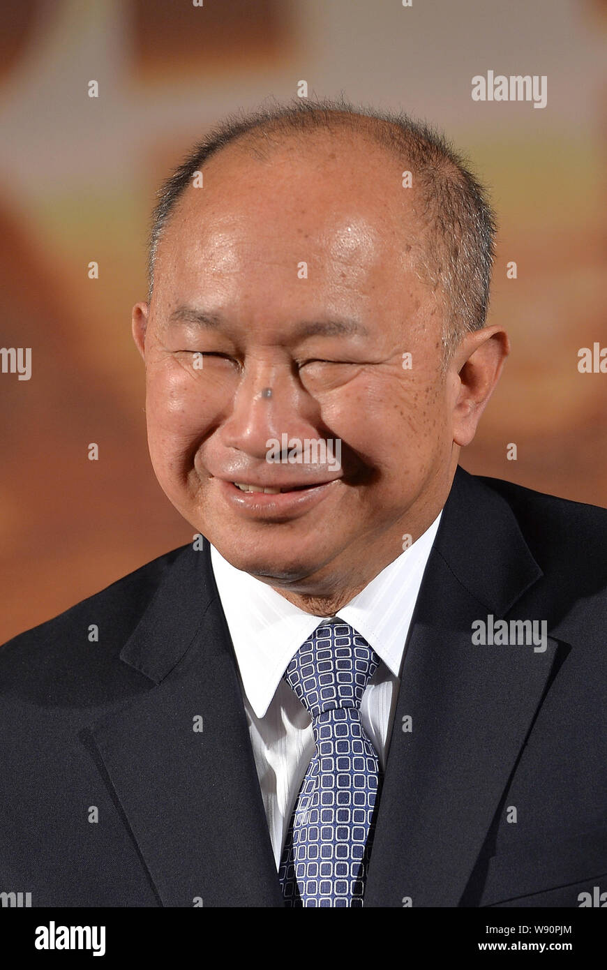Hong Kong director John Woo smiles during a press conference for his ...