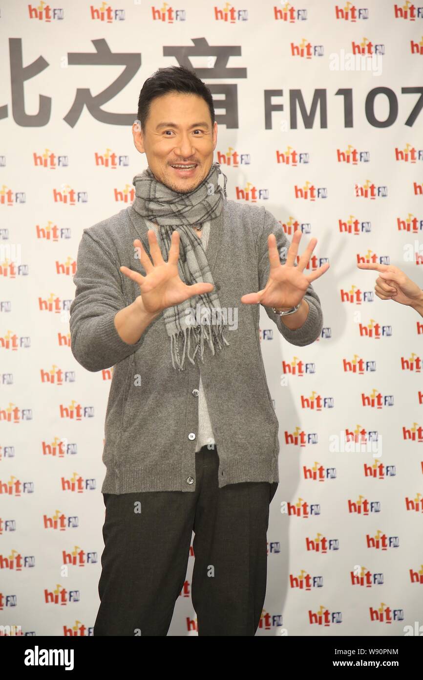 Hong Kong singer Jacky Cheung waves at a promotional event for his new ...